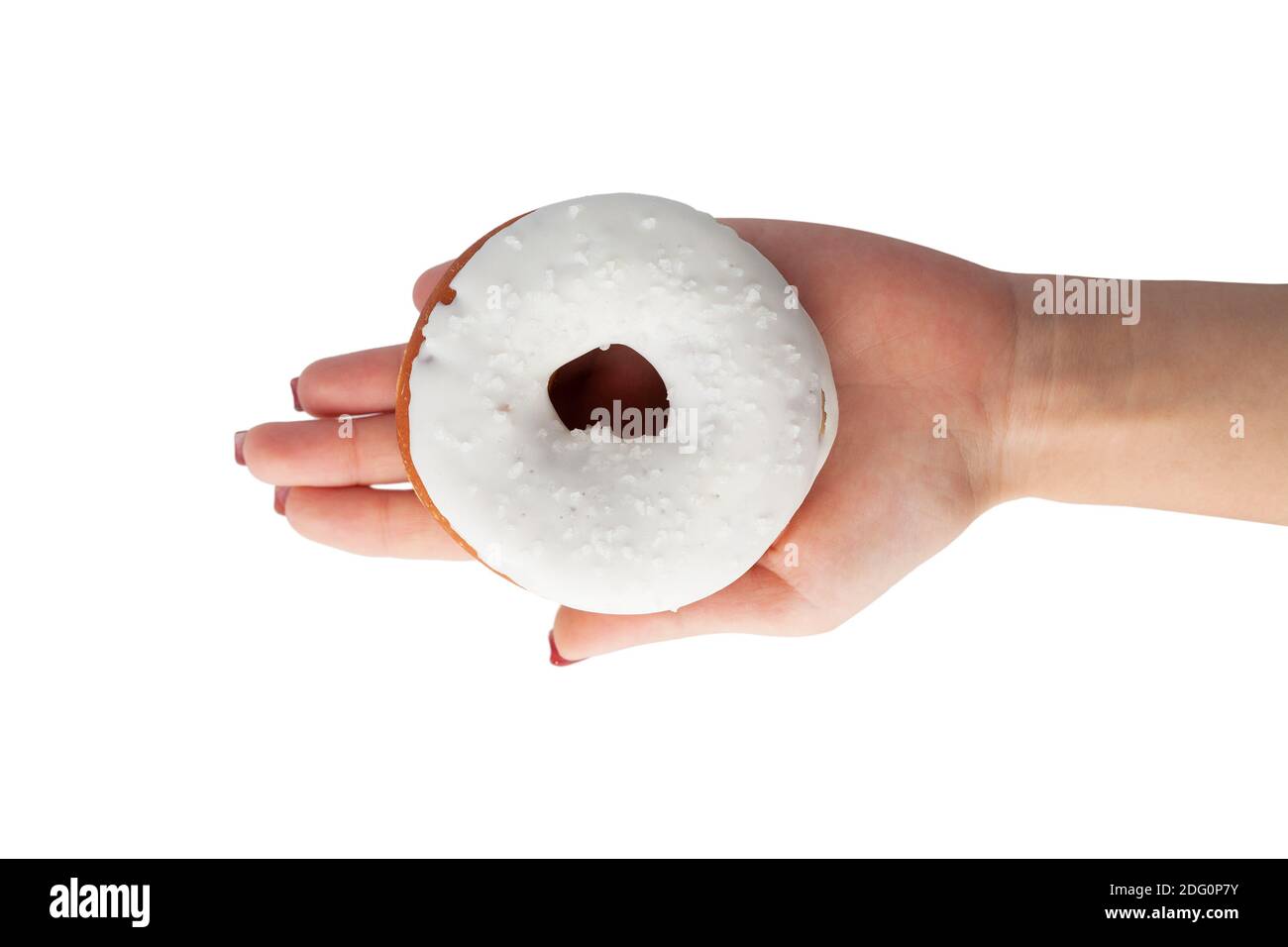 Female hand holds with fingers a donut in sugar glaze isolated on white ...