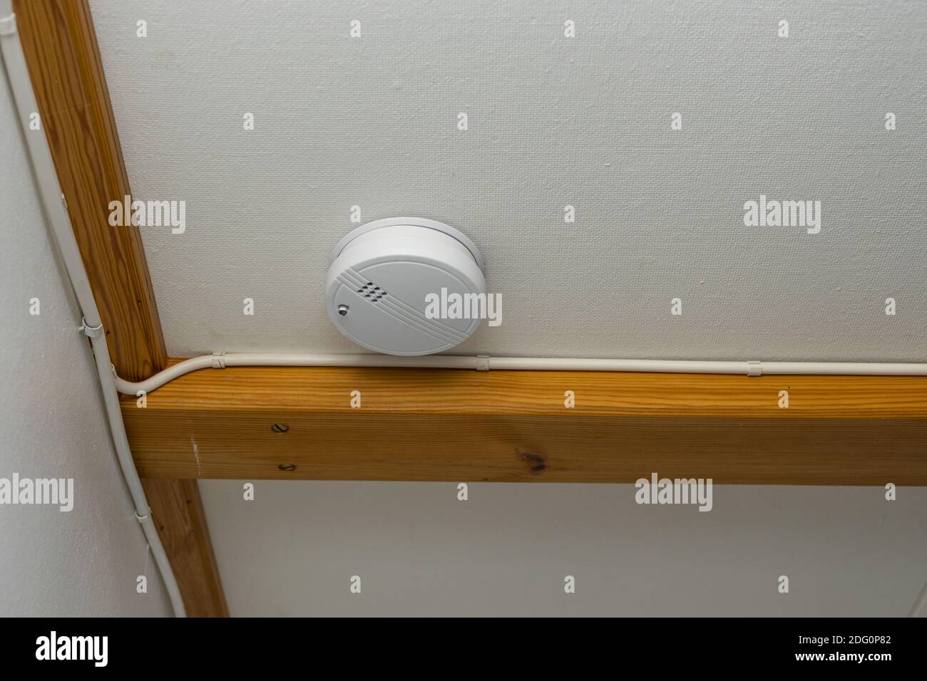 Close up view of home smoke alarm detector isolated. Security system ...