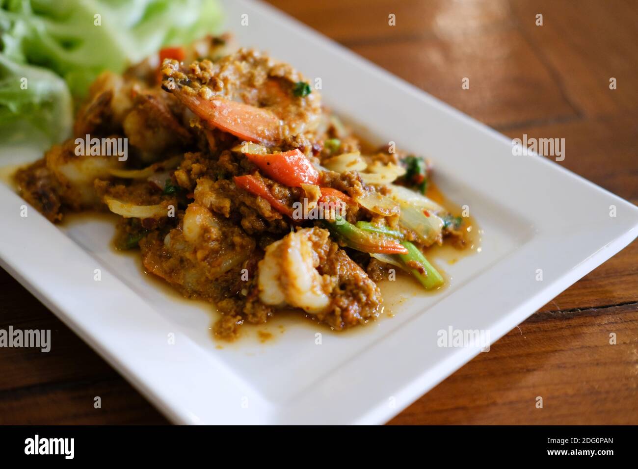 shrimp prawn stir fried with curry powder paste Stock Photo - Alamy