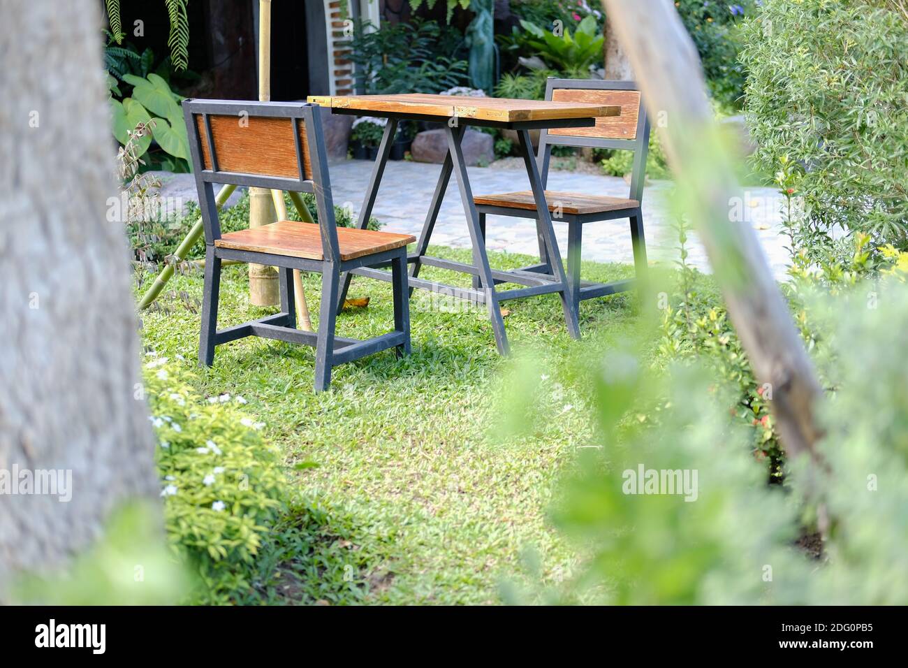 wooden chair seat for resting in garden park Stock Photo - Alamy