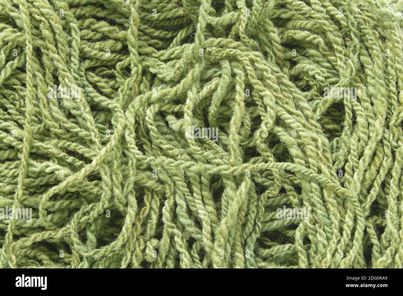 Green woolen yarn Stock Photo - Alamy