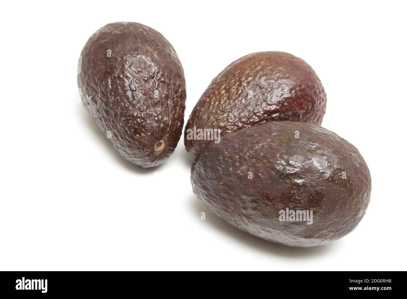 Whole ripe avocados green Cut Out Stock Images & Pictures - Alamy