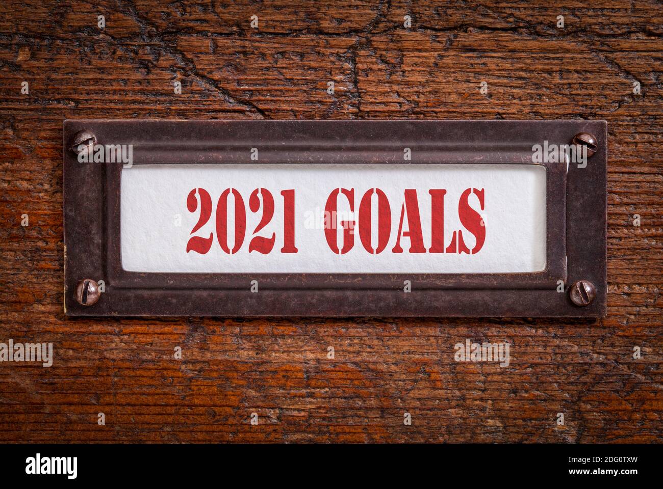2021 predictions - a label on grunge wooden file cabinet. Expectation ...