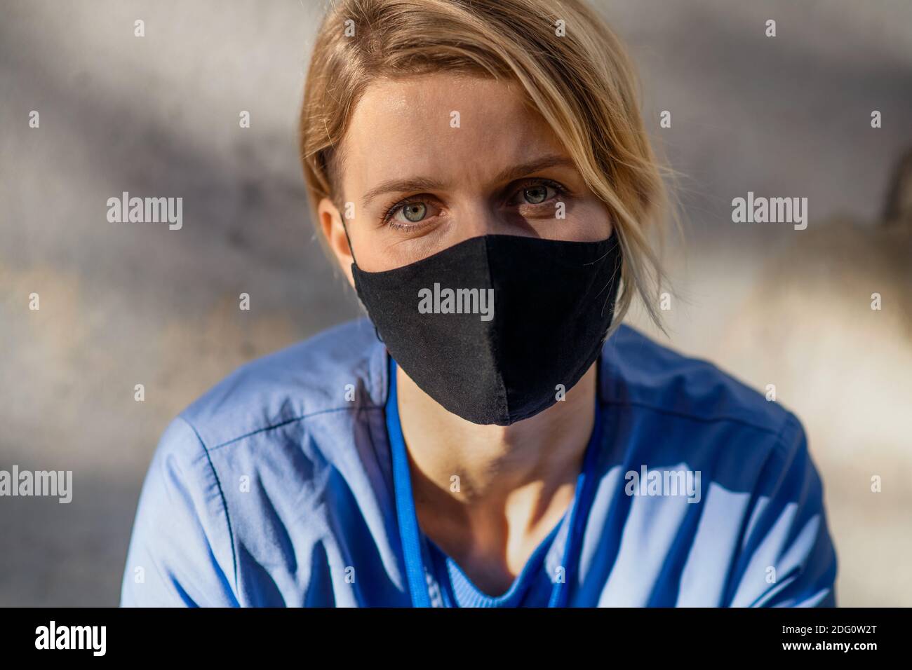 Front view portrait of woman caregiver, nurse or healthcare worker ...