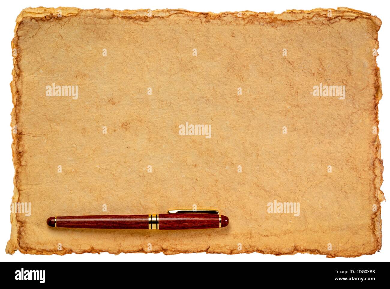 isolated stack of tan toned heavyweight deckle edge paper sheets with a ...