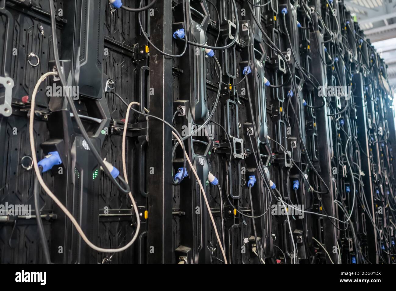 Back side of large combined advertising LED display with cables wire ...