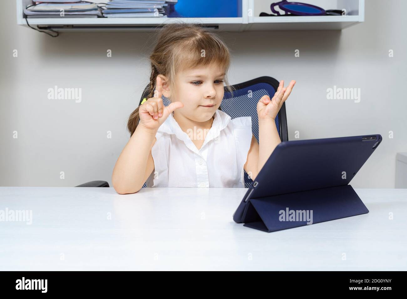 little girl doing mental arithmetic online. method of teaching quick ...