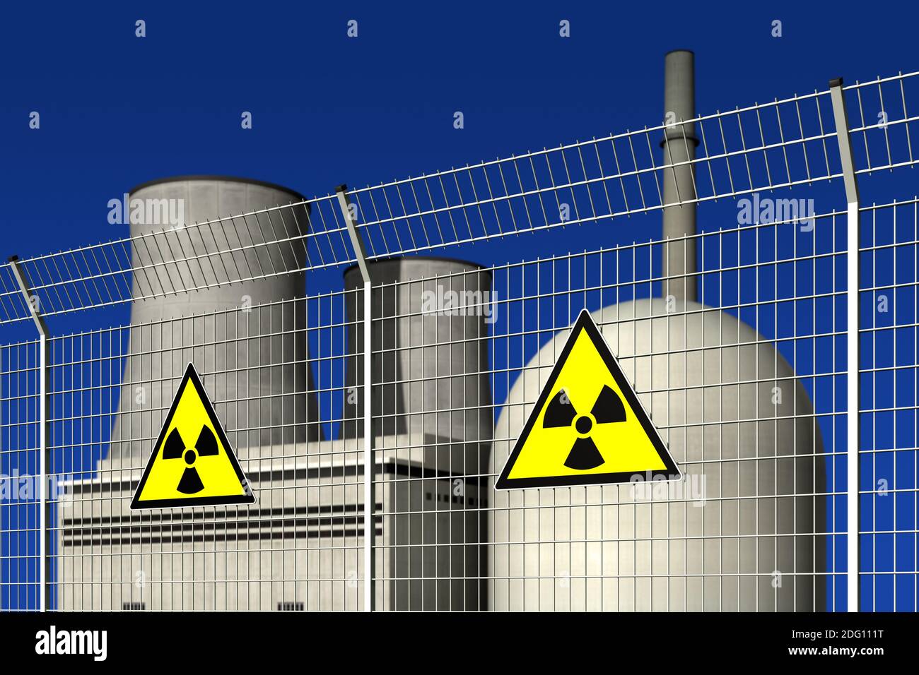 Nuclear power plant behind a barrier fence with warning signs for ...