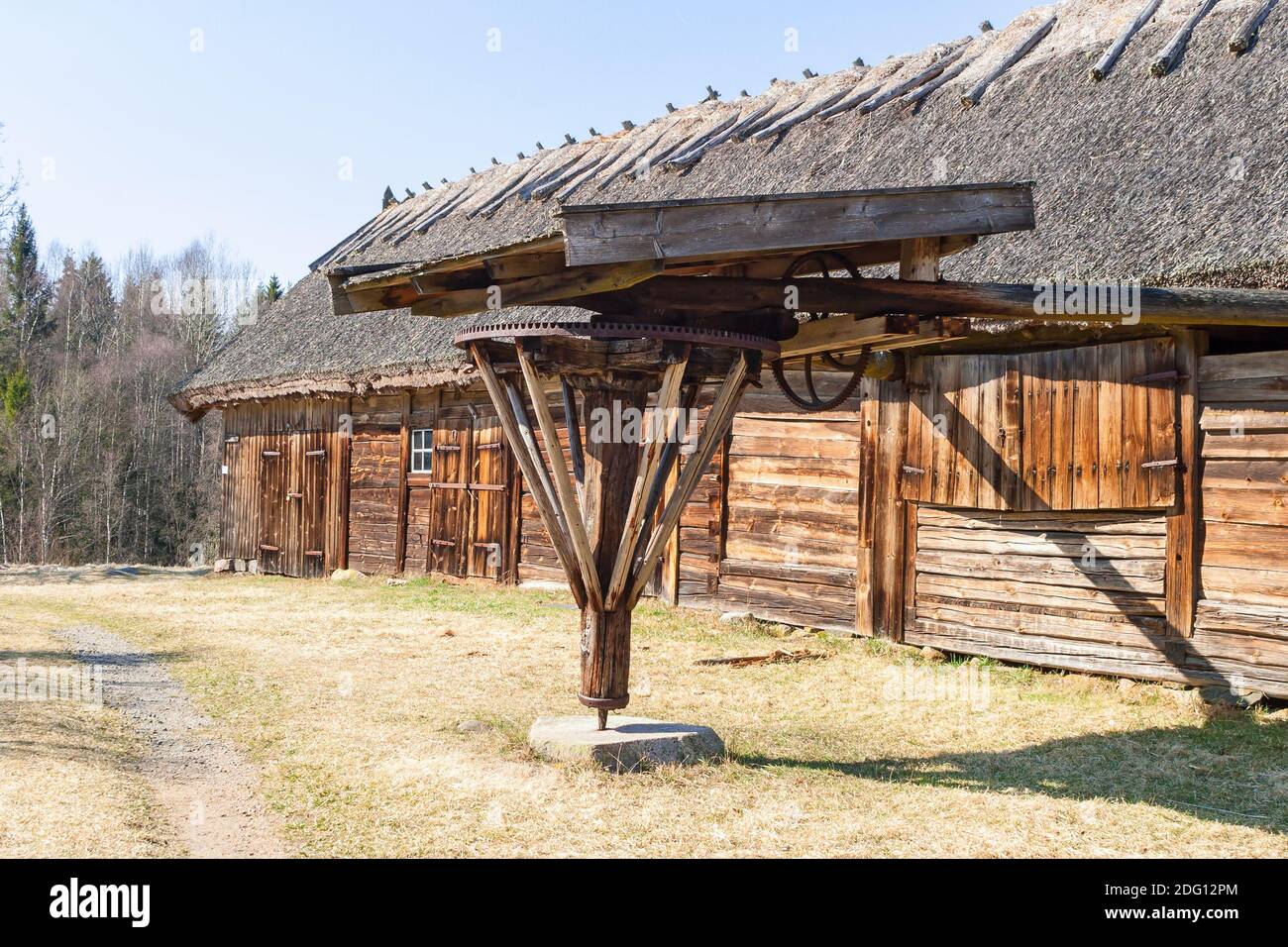 Old weathered barn with a animal mill Stock Photo - Alamy
