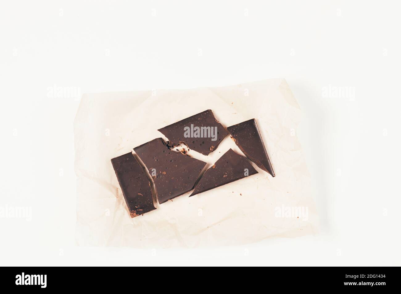 Dark chocolate on paper hi-res stock photography and images - Alamy