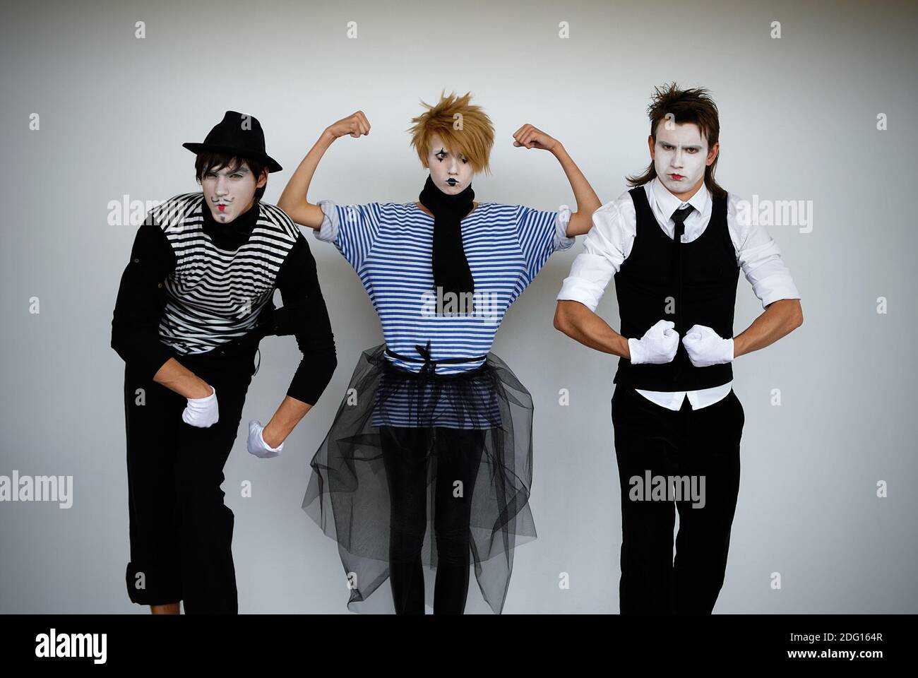 Three mime actors in action Stock Photo - Alamy