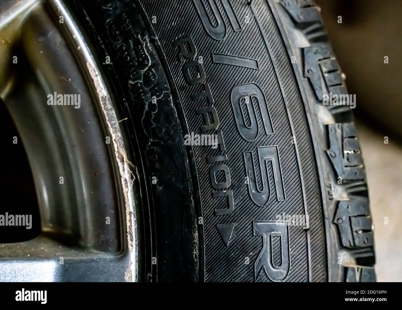 Close up of the writing Rotation on a winter tire for a car indicating ...