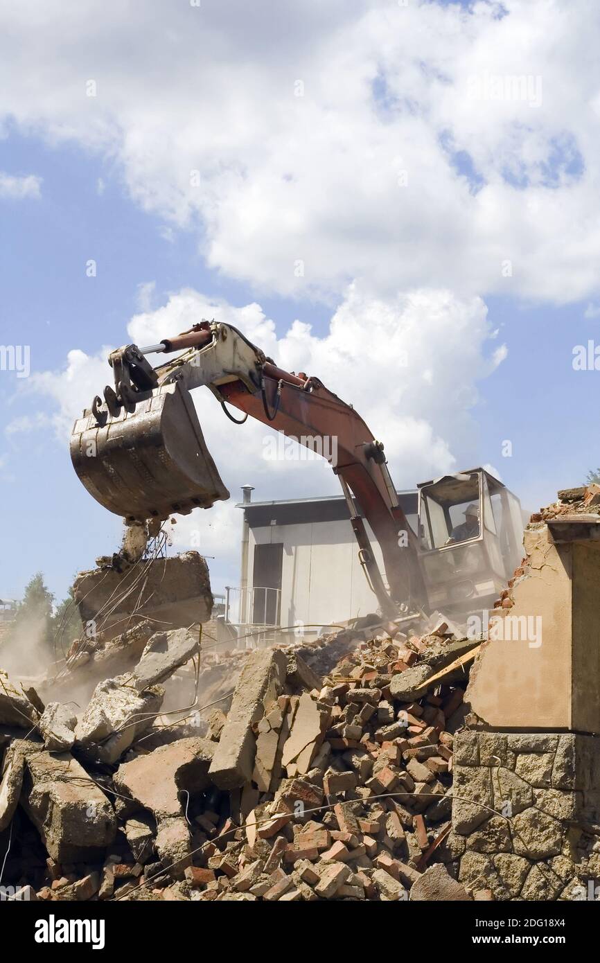 Bulldozer demolishing hi-res stock photography and images - Alamy