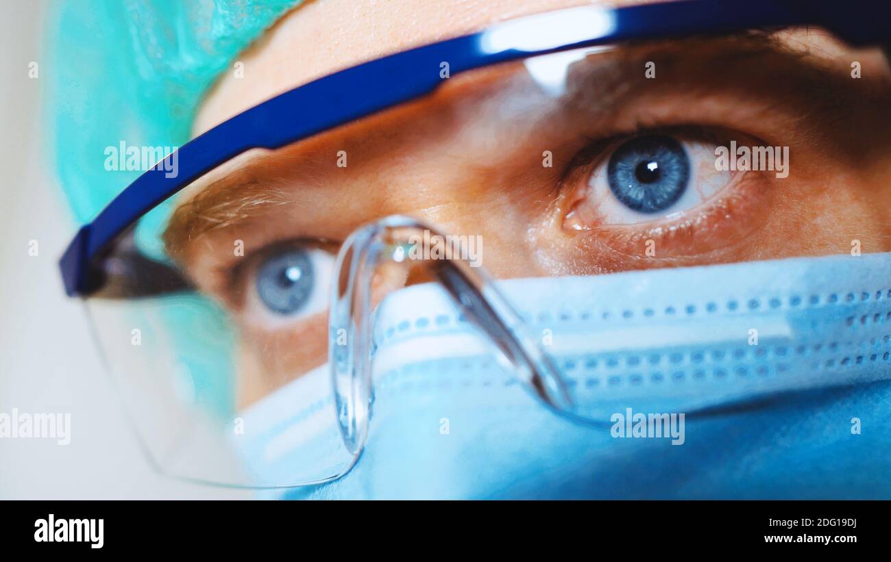 Male scientist wearing protective mask hi-res stock photography and ...
