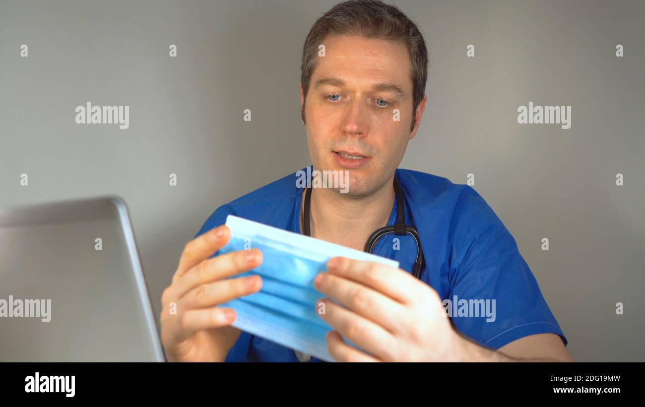 Medical doctor showing how to wear the mask during coronavirus lockdown ...