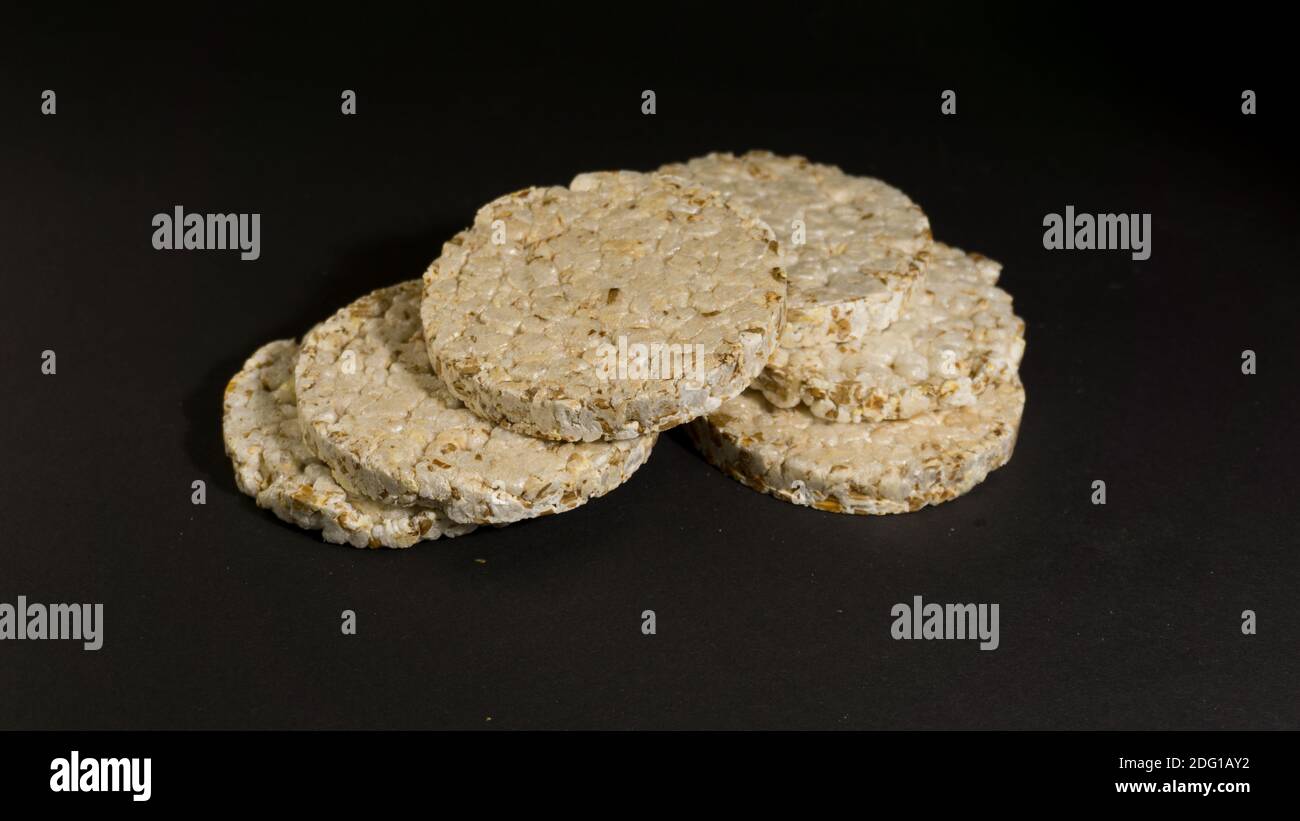 Grain crispbreads crispy rice and diet bread. Stack of puffed whole ...