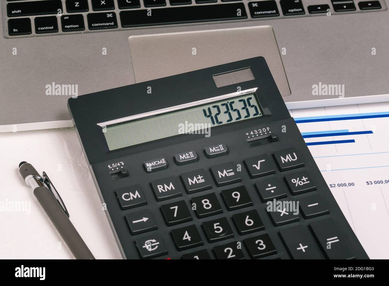Calculator, pen and notebook close up. Financial statements. Documents ...