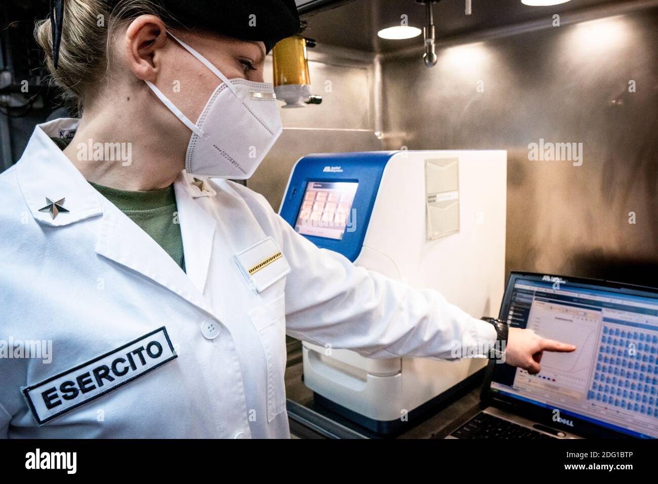 Biomedical Laboratory Technician Marshal Spinelli wearing a facemask ...