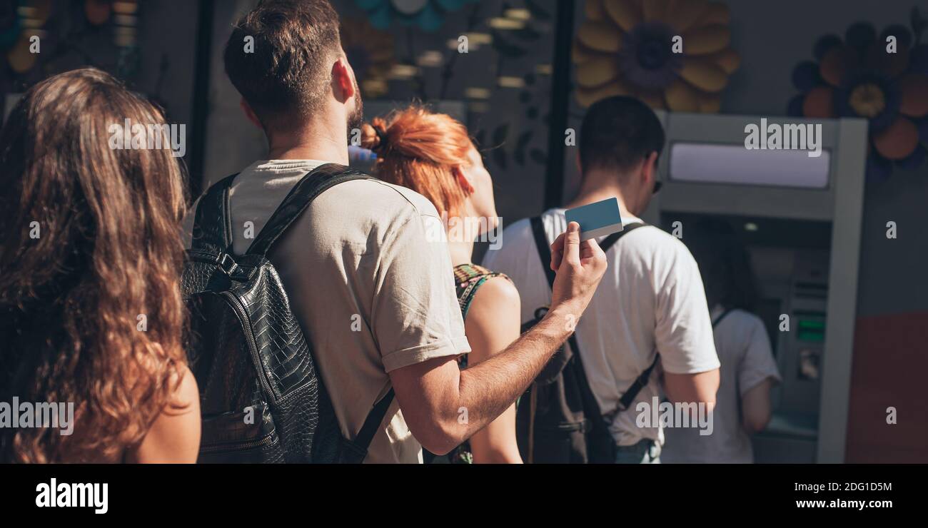 Line to ATM. Group of people waiting to withdraw money to bank card ...