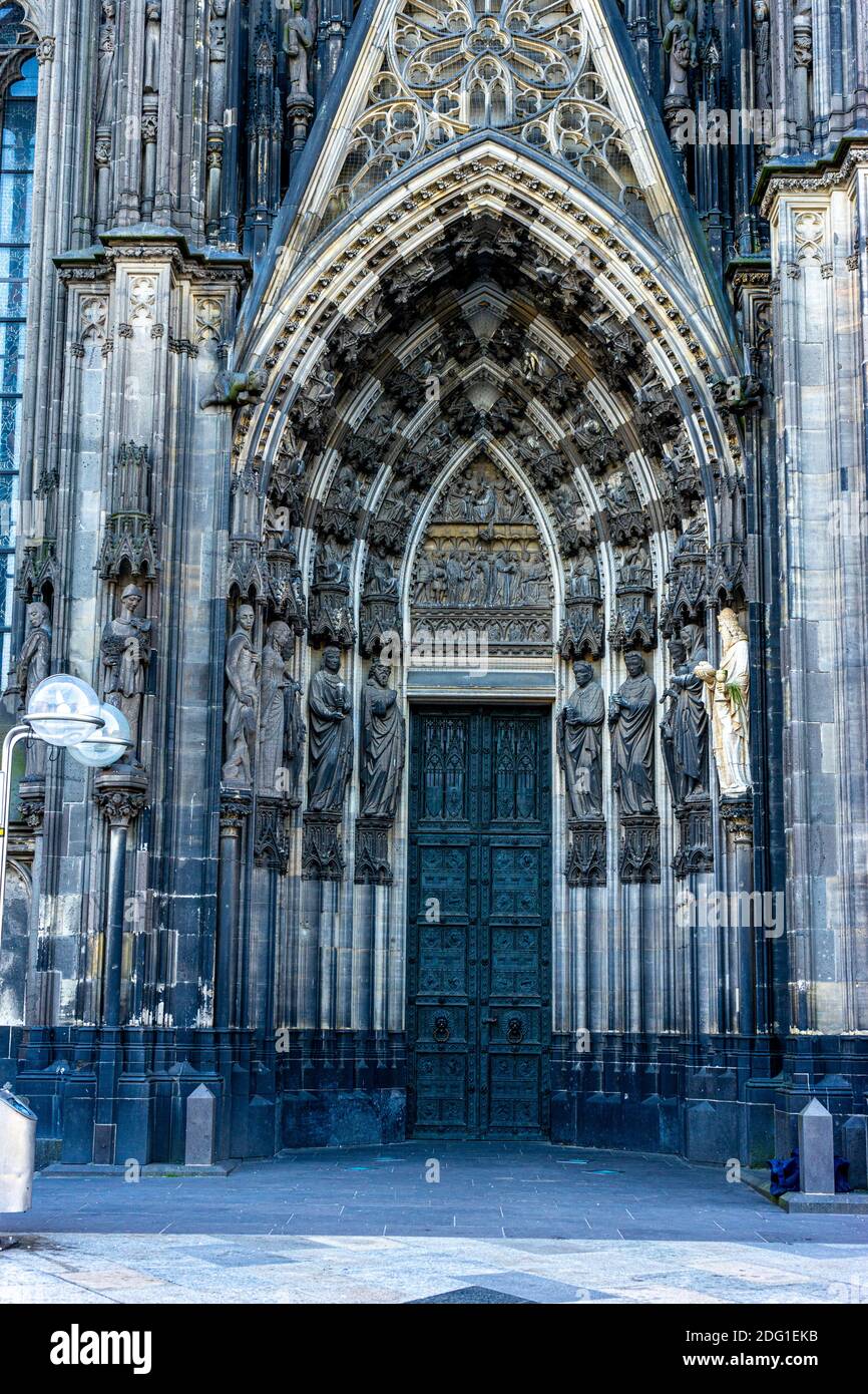 A vertical shot of a historic Cologne Cathedral facade details with ...