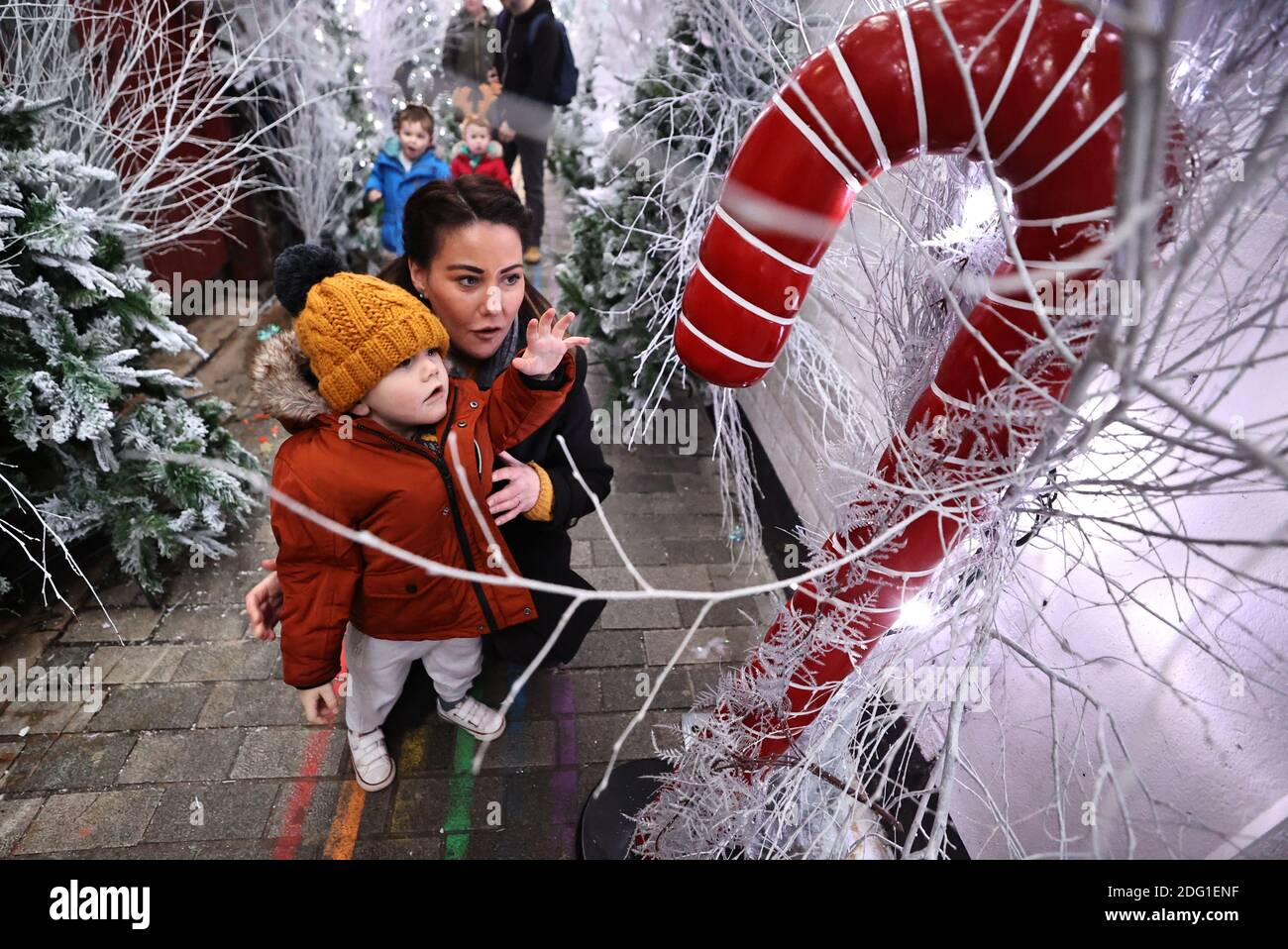 Two year old Antoin McCready walking through The Jailhouse Christmas ...