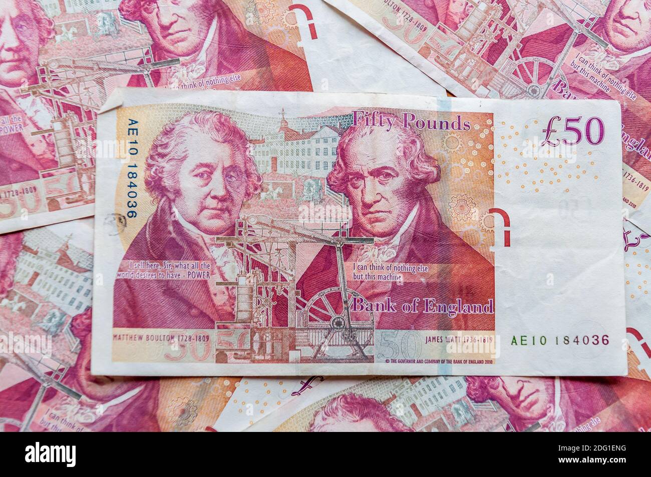 A close-up of British £50 banknotes,thread, watermark, microlettering ...