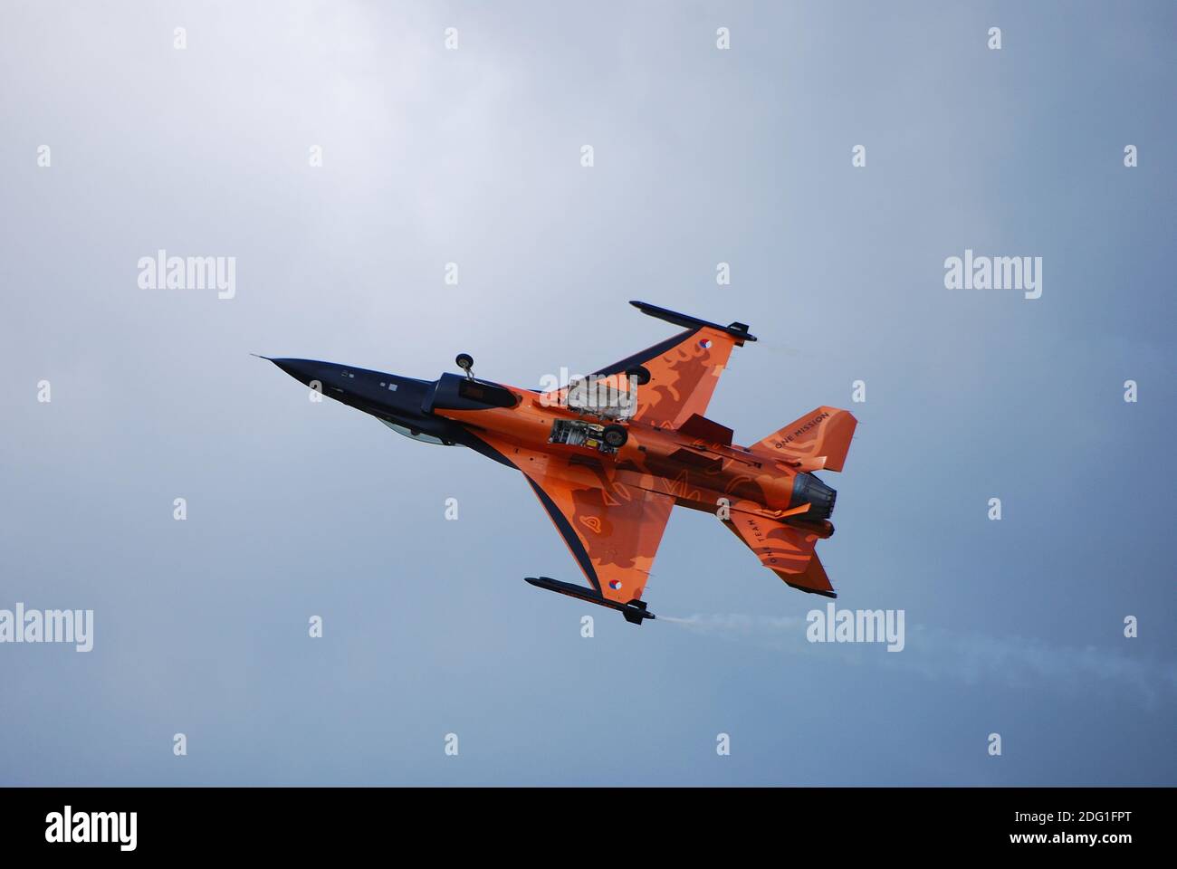 Orange aircraft operating Stock Photo - Alamy