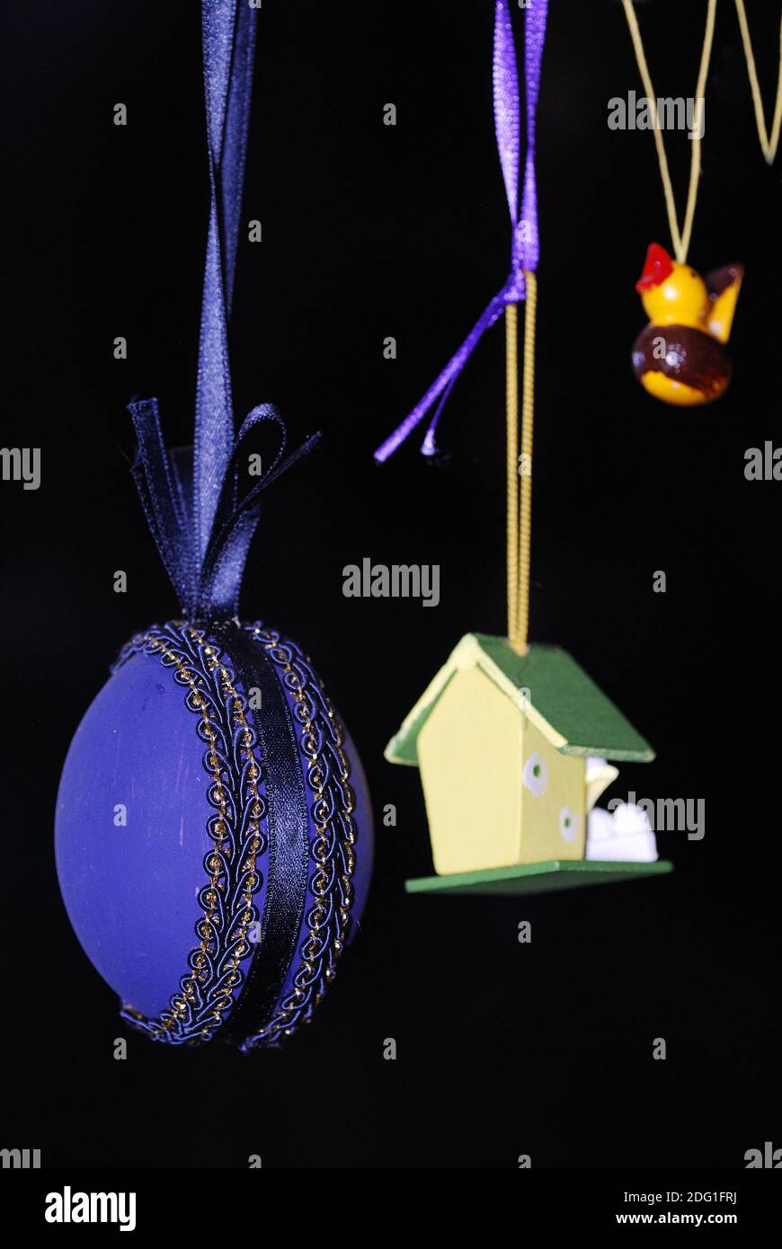 Easter tree with egg and house Stock Photo - Alamy