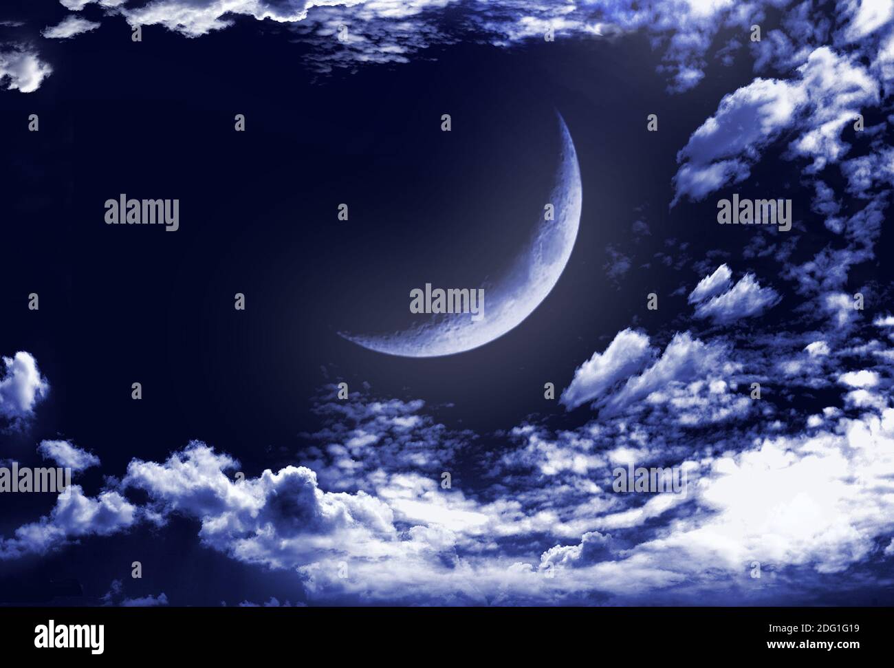 Half of moon in clouds Stock Photo - Alamy