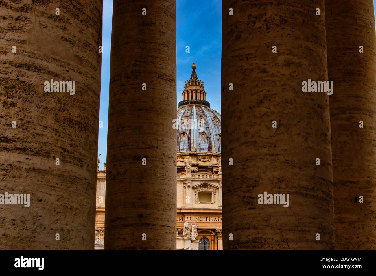 View through a few columns on St. Peter's Basilica in the Vatican state ...