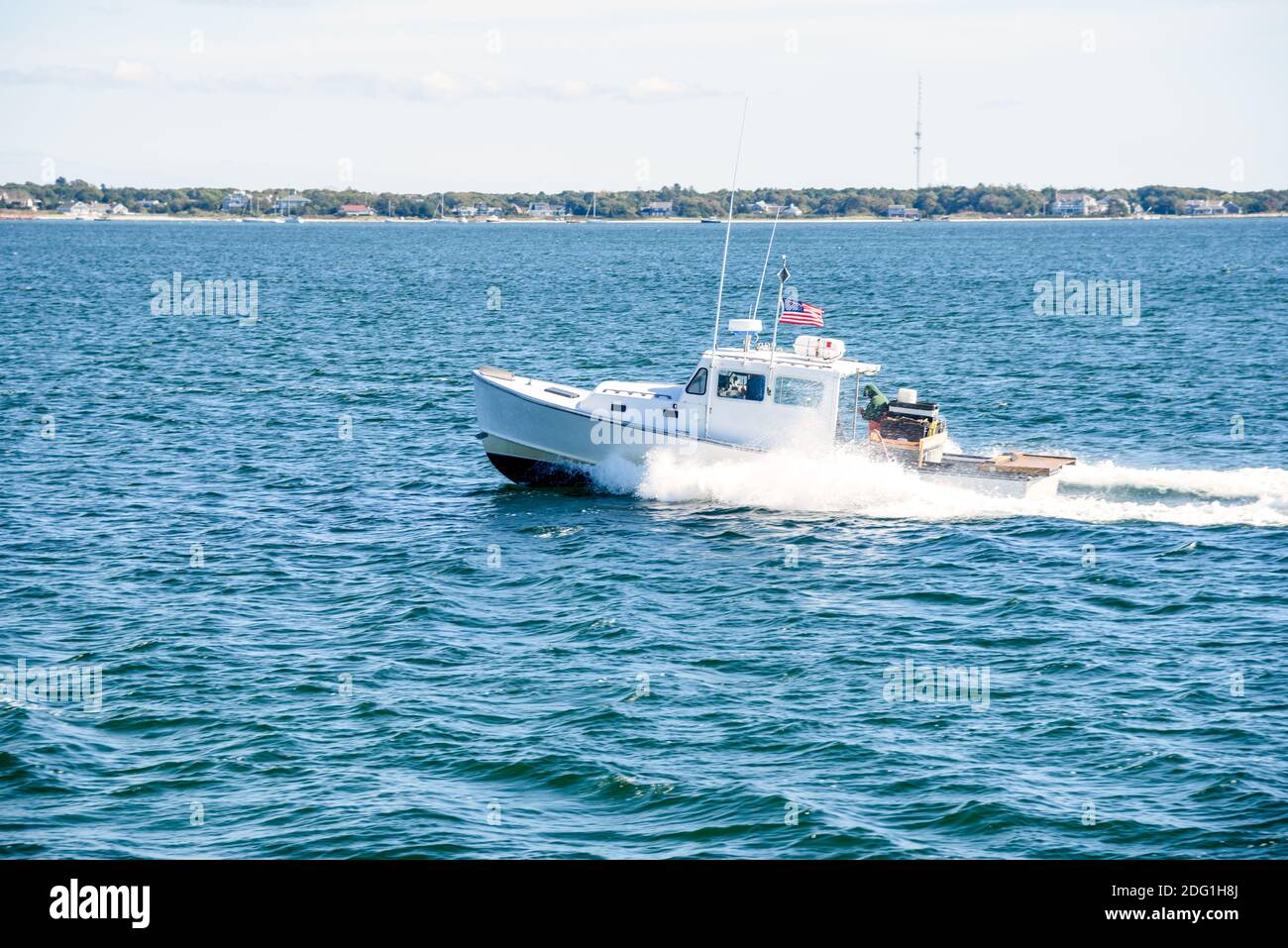 Fishing boat in navigation off the coast of Cape Cod, MA, in autumn ...