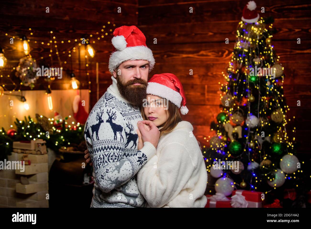Loving couple cuddle christmas tree background. Fall in love. Couple in ...