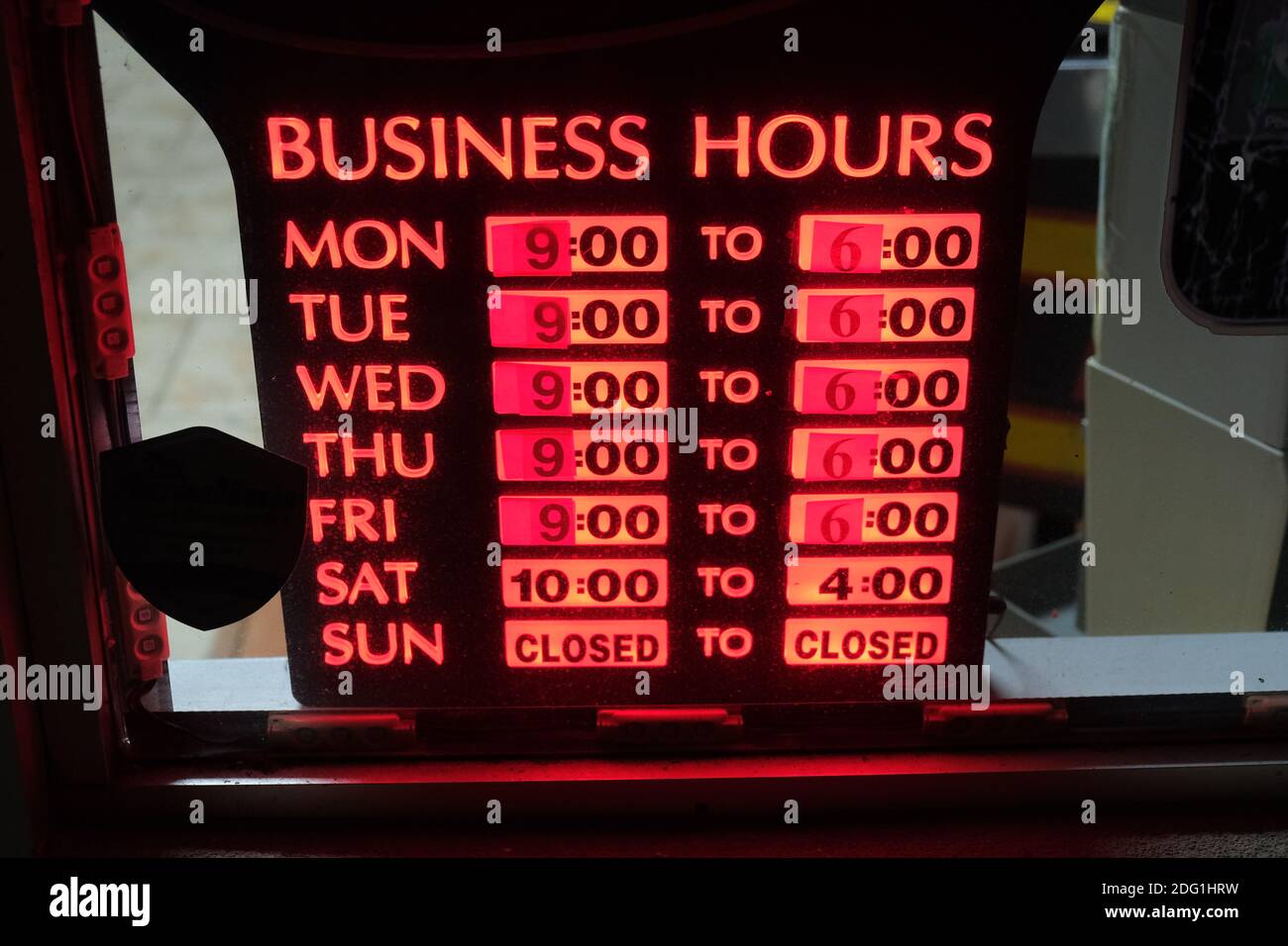 Business Hours Neon Sign Storefront Stock Photo - Alamy