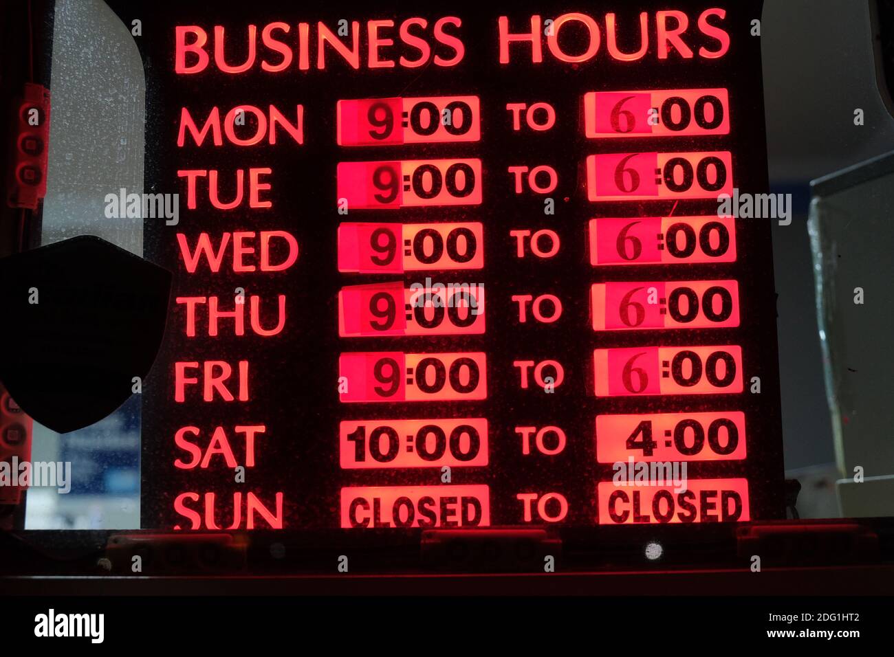 Business Hours Neon Sign Storefront Stock Photo - Alamy