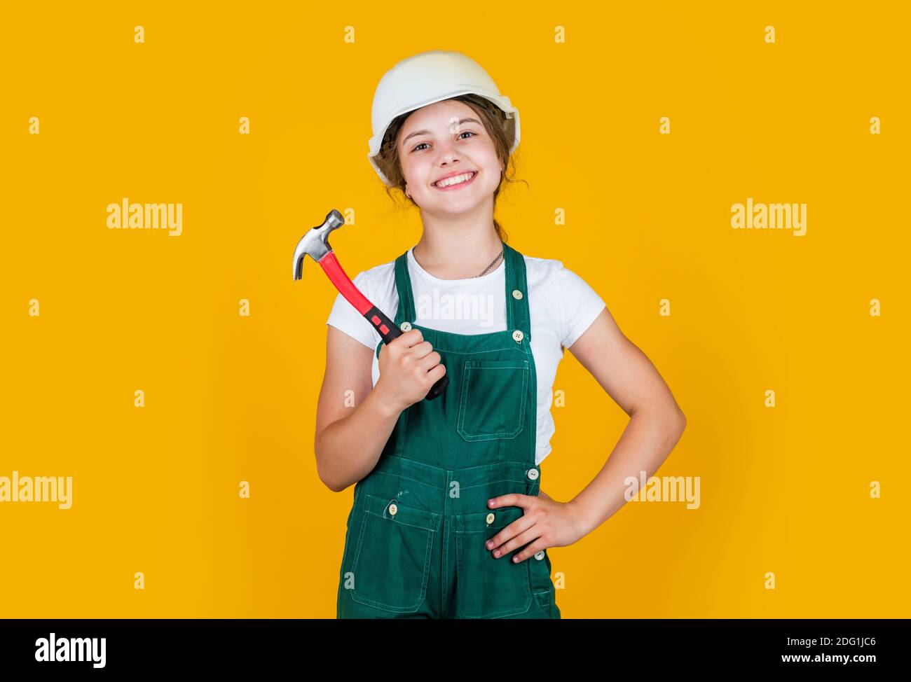 I know everything about cars. future engineer. happy kid use hammer ...