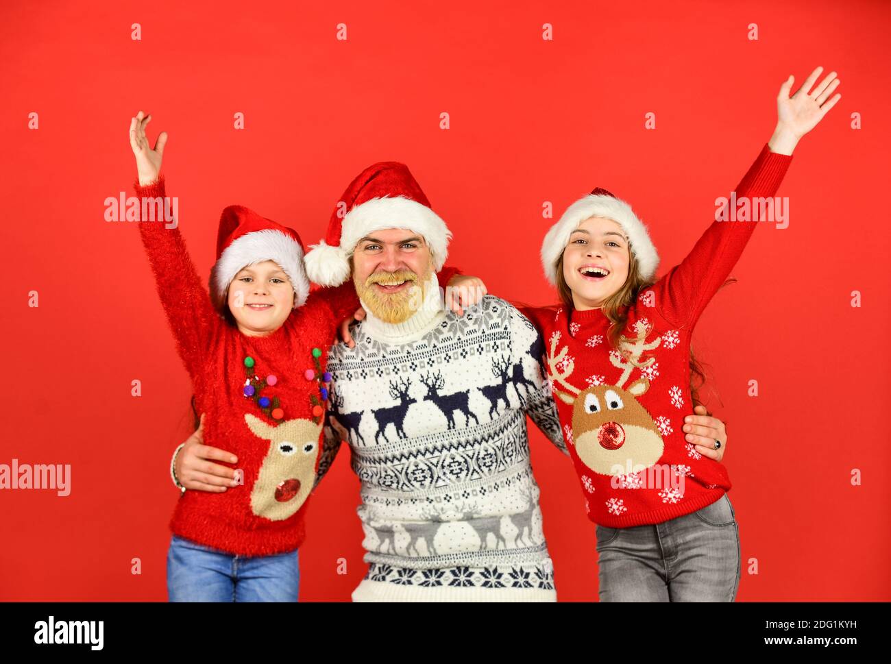 Family time. Father and little daughters celebrate new year together ...