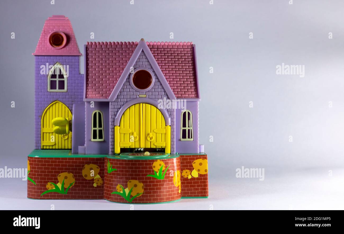 Plastic miniature toy house multicolored in white background Stock ...