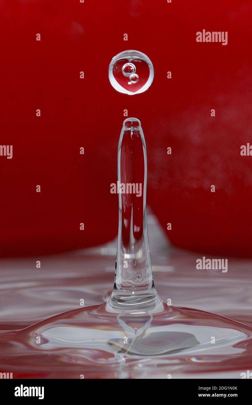 Heart drop inside Stock Photo - Alamy