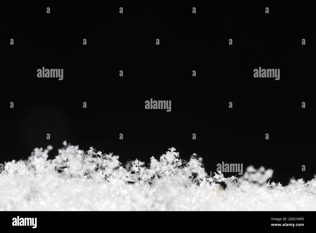 Snow crystals lying Stock Photo - Alamy