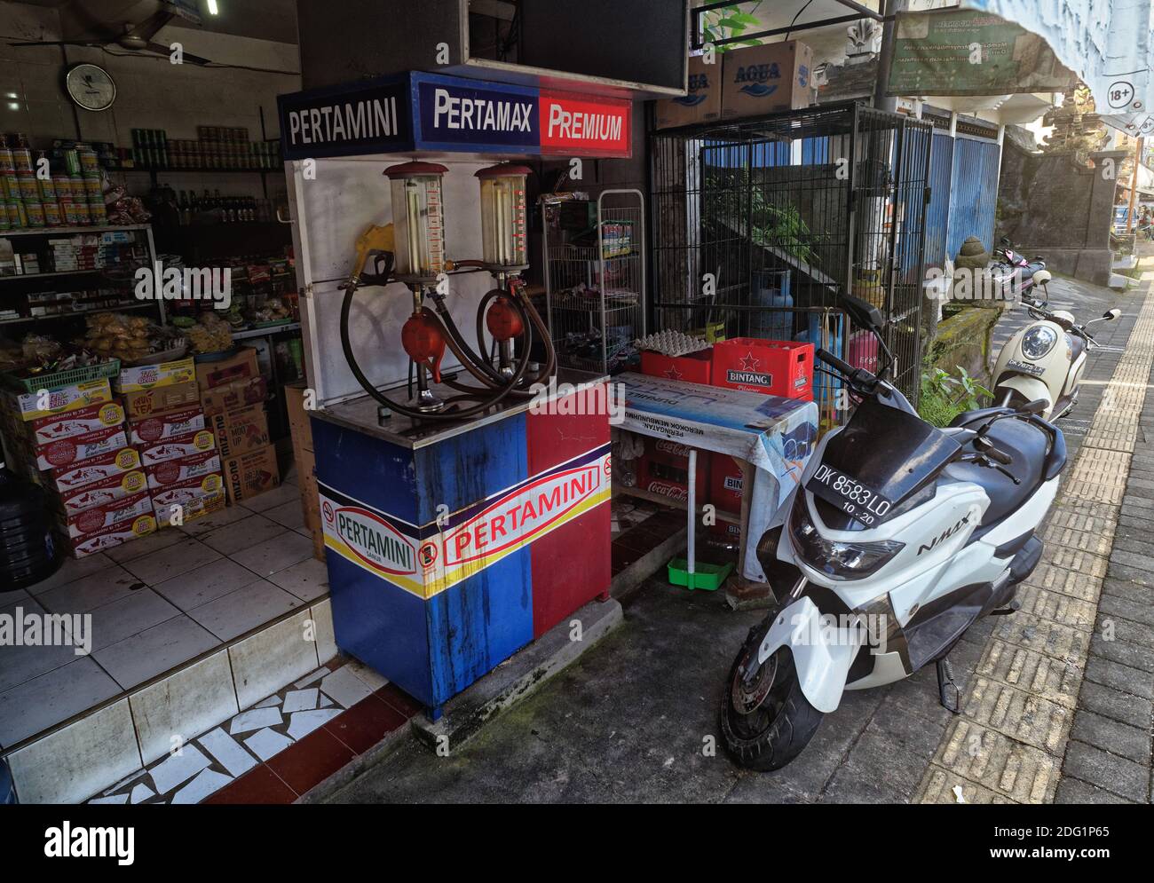Petrol pumps art the front of a roadside convenience store for the many ...