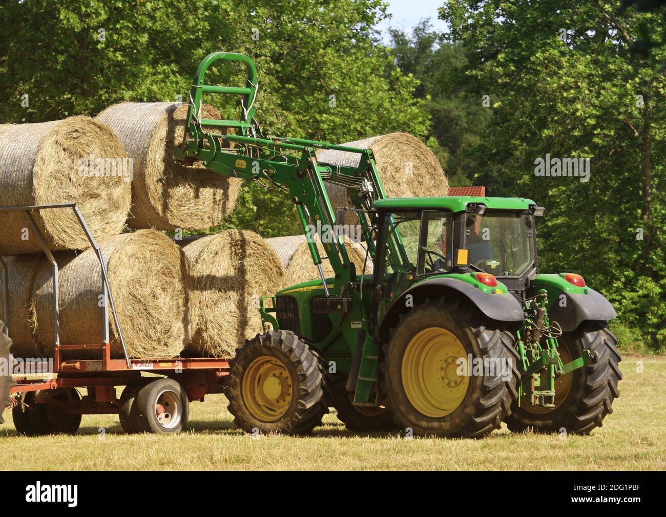 Tractor in field Stock Photo - Alamy