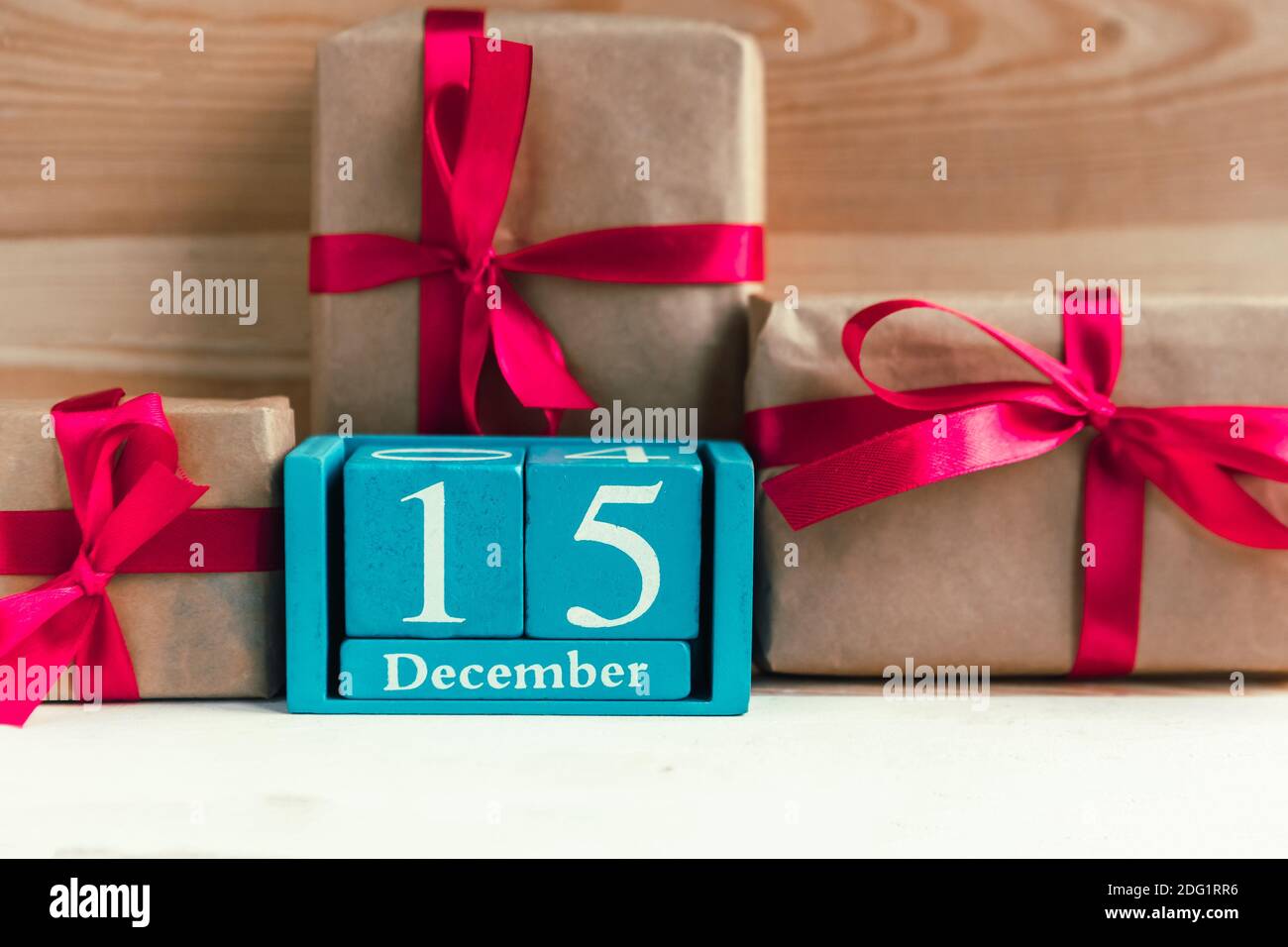 December 15. Blue cube calendar with month and date and gift boxes ...