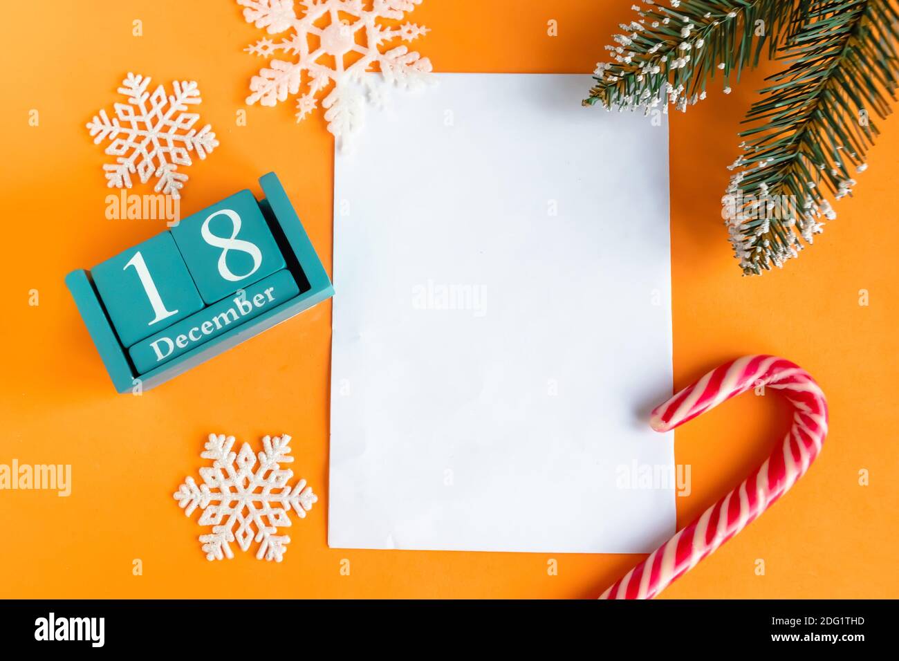 December 18. Blue cube calendar with month and date and white mockup ...