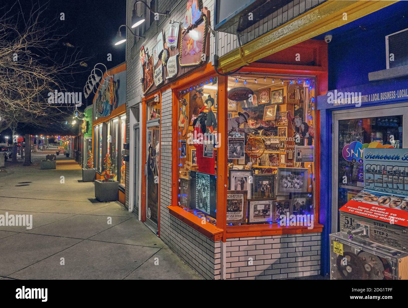 multi-colored storefronts in Rehoboth Beach, DE at night Stock Photo ...