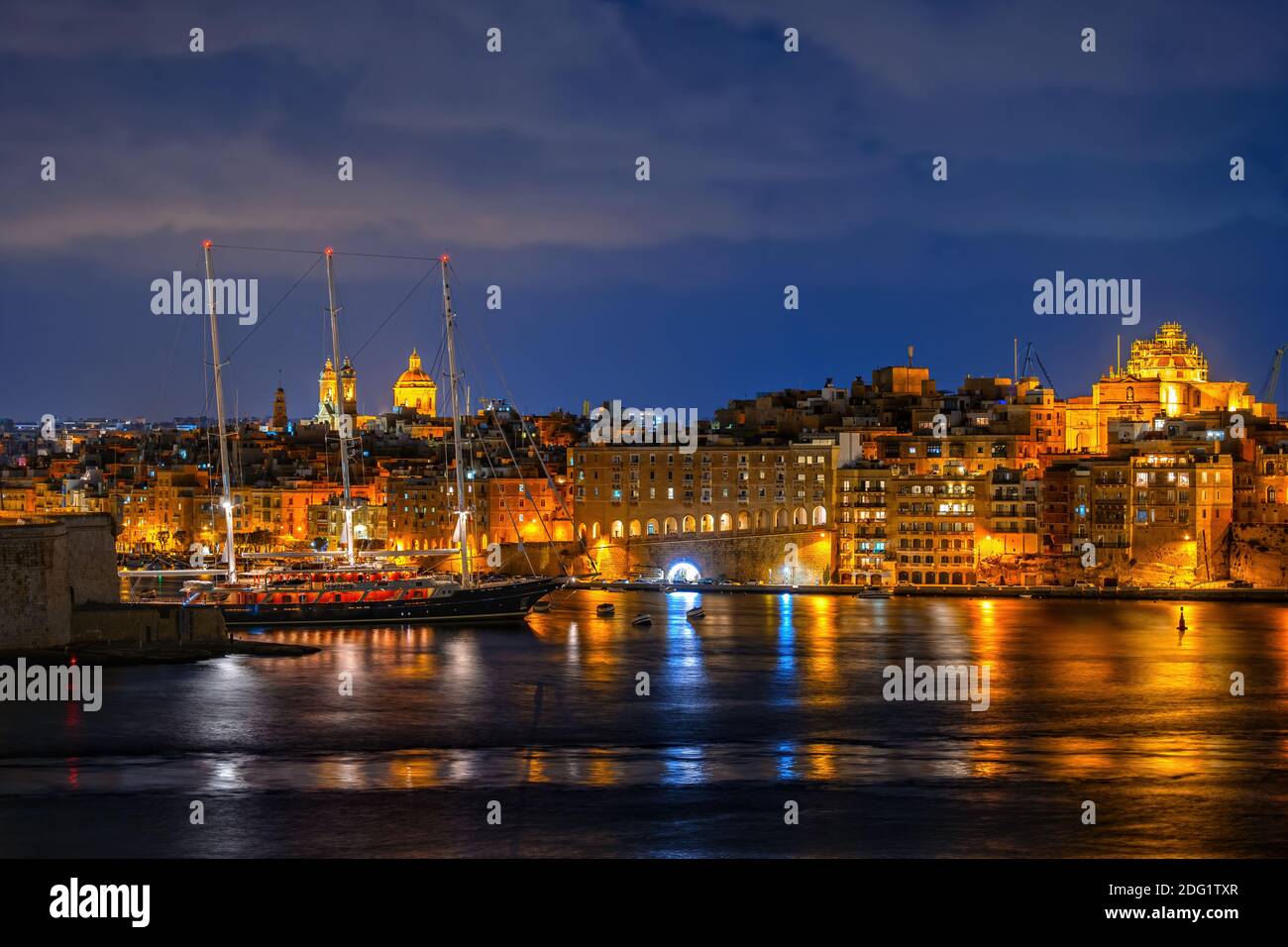 Senglea city skyline at night in Malta from the Grand Harbor Stock ...