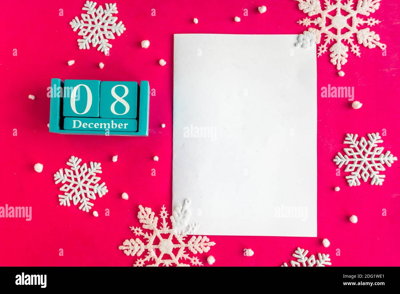 December 8. Blue cube calendar with month and date and white mockup ...