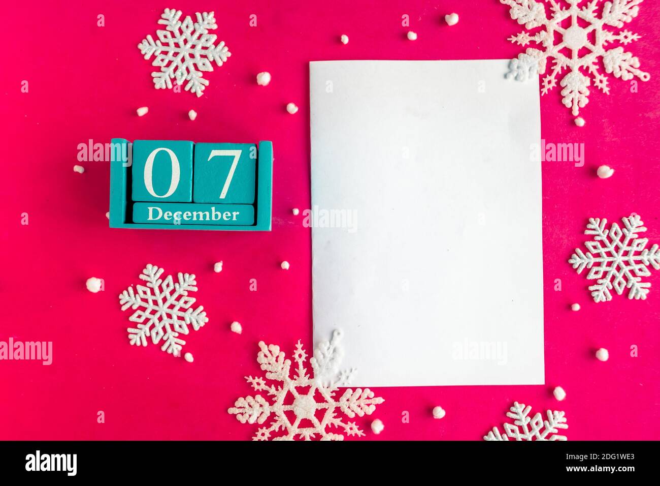 December 7. Blue cube calendar with month and date and white mockup ...