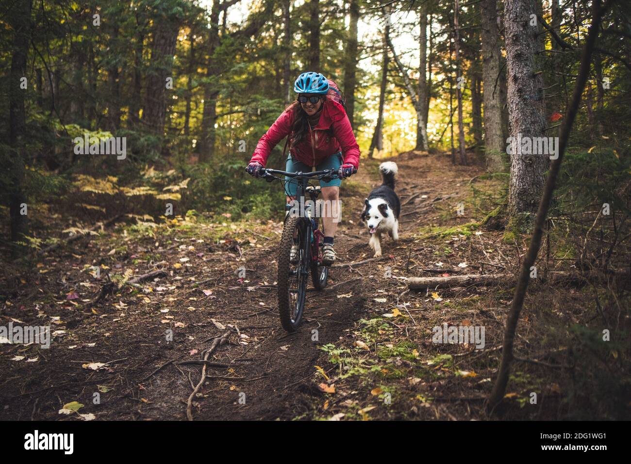Women biking into frame hi-res stock photography and images - Alamy