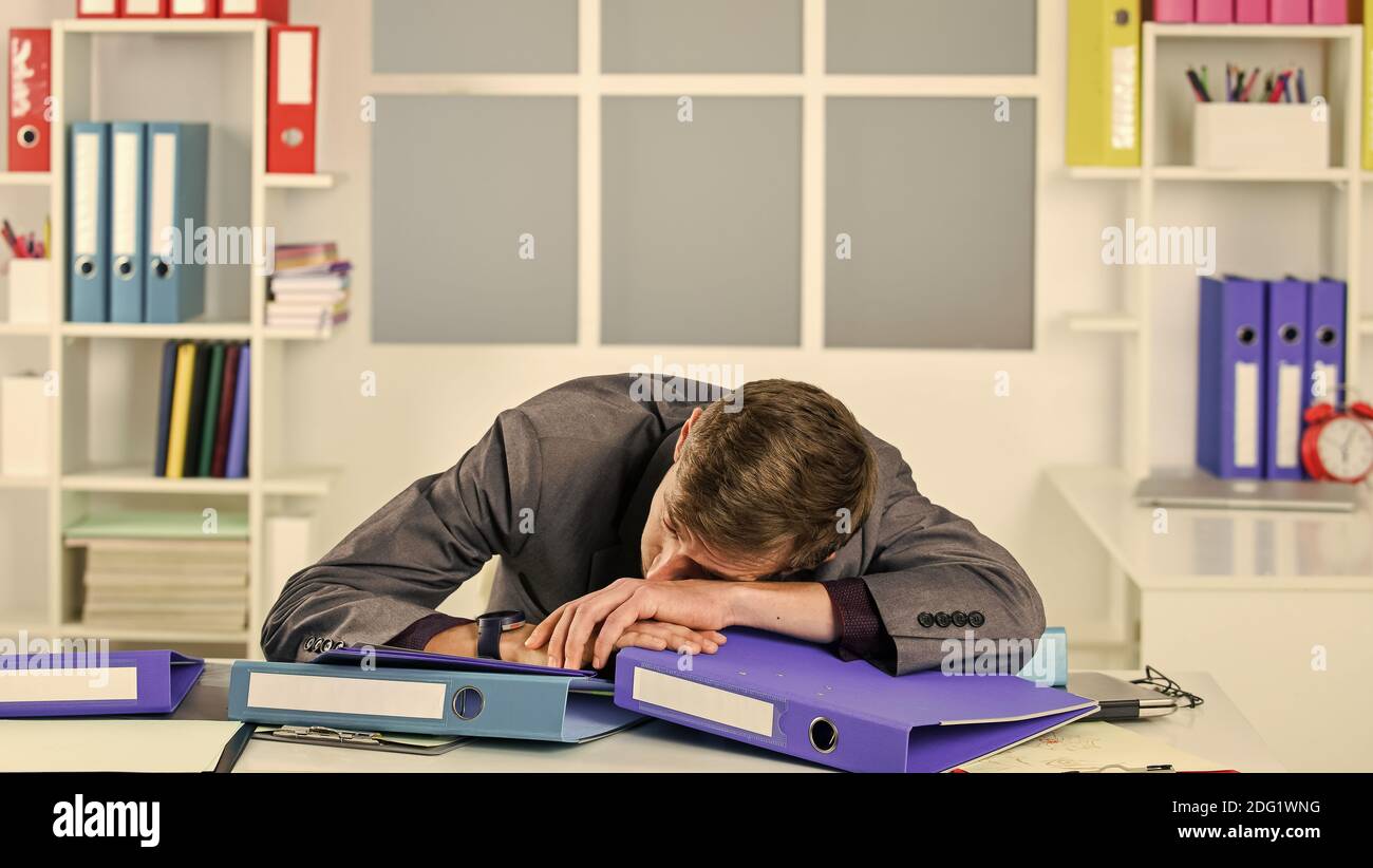 so early morning. tired sleeping ceo. young businessman working in ...