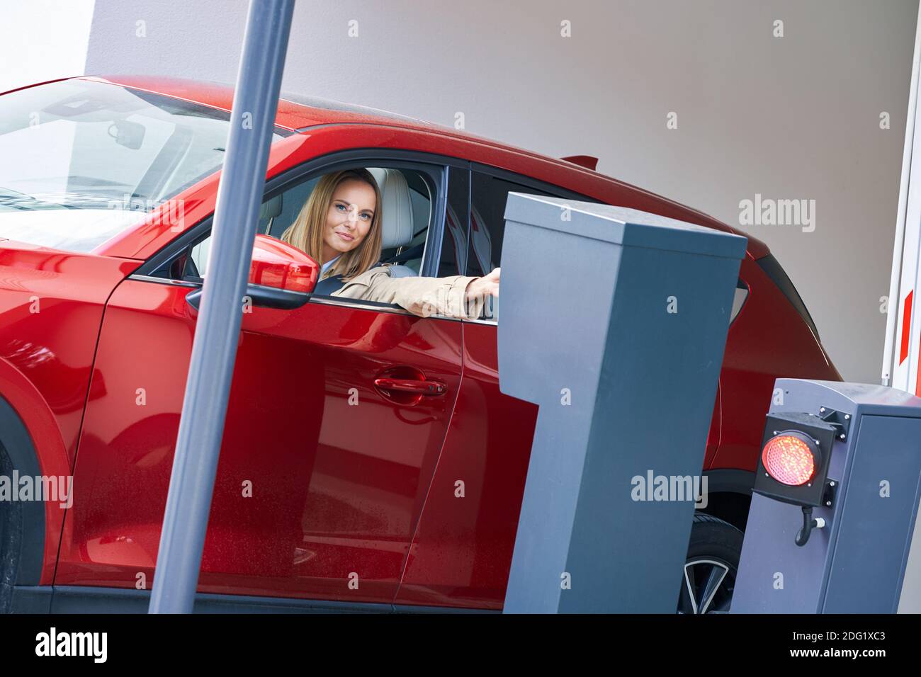 Woman using parking meter hi-res stock photography and images - Alamy